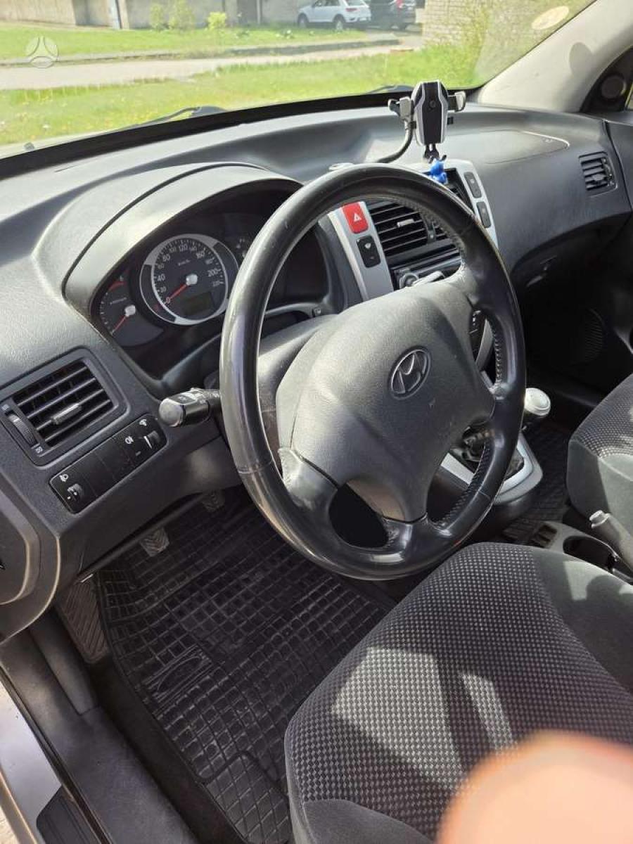 Grey Hyundai Tucson 2006 in Klaipeda, with an engine capacity of 1.99 L and mileage of 234 thousand km for 2300 €, photo 8 on AUTOMOTO.COM.LV