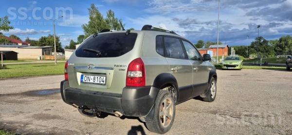 Grey Hyundai Tucson 2006 in Jekabpils, with an engine capacity of 2.00 L and mileage of 315 thousand km for 2150 €, photo 5 on AUTOMOTO.COM.LV