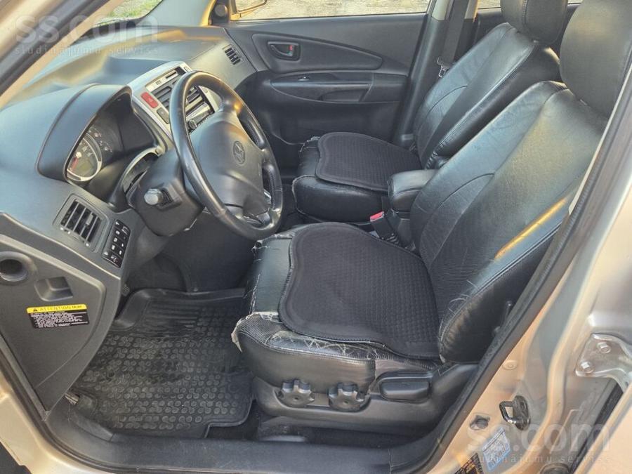 Pelēks Hyundai Tucson 2006 Bauska, ar dzinēja tilpumu 2.00 L un nobraukumu 318 tūkst. km par 1550 €, foto 12 vietnē AUTOMOTO.COM.LV