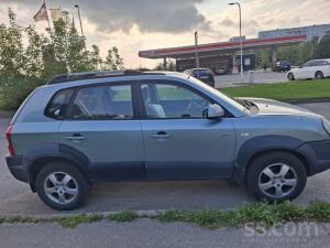 Grey Hyundai Tucson 2006 in Riga, with an engine capacity of 2.00 L and mileage of 269 thousand km for 2800 €, photo 4 on AUTOMOTO.COM.LV