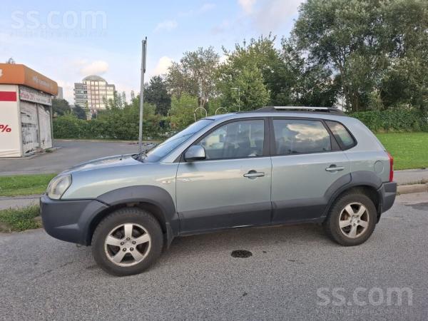 Grey Hyundai Tucson 2006 in Riga, with an engine capacity of 2.00 L and mileage of 269 thousand km for 2800 €, photo 6 on AUTOMOTO.COM.LV