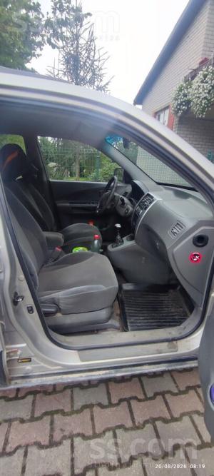 Grey Hyundai Tucson 2006 in Riga, with an engine capacity of 2.00 L and mileage of 300 thousand km for 650 €, photo 6 on AUTOMOTO.COM.LV