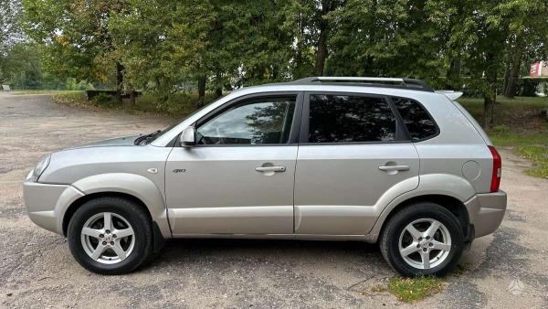 Pelēks Hyundai Tucson 2006 Molėtai, ar dzinēja tilpumu 1.99 L un nobraukumu 274 tūkst. km par 2500 €, foto 7 vietnē AUTOMOTO.COM.LV