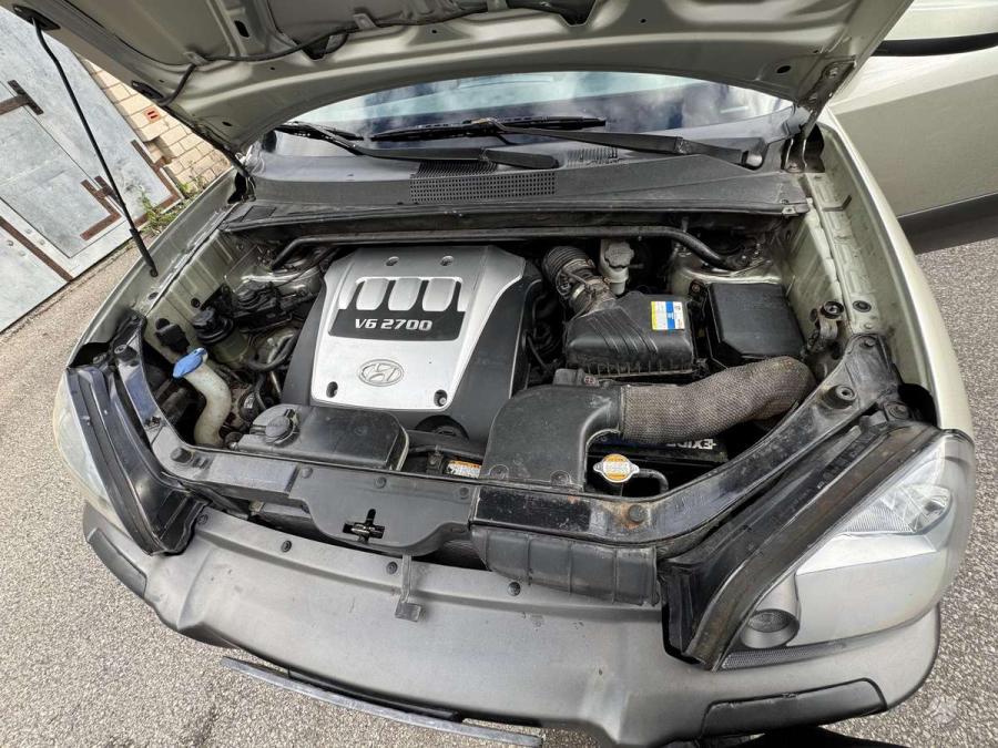 Grey Hyundai Tucson 2006 in Panevezys, with an engine capacity of 2.70 L and mileage of 321 thousand km for 4000 €, photo 14 on AUTOMOTO.COM.LV