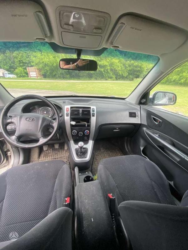 Pelēks Hyundai Tucson 2007 Panevēža, ar dzinēja tilpumu 1.99 L un nobraukumu 283 tūkst. km par 2900 €, foto 7 vietnē AUTOMOTO.COM.LV