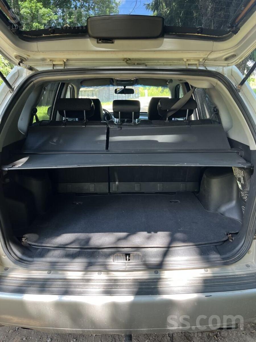 Grey Hyundai Tucson 2007 in Gulbene, with an engine capacity of 2.00 L and mileage of 288 thousand km for 2700 €, photo 21 on AUTOMOTO.COM.LV