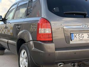 Grey Hyundai Tucson 2007 in Siauliai, with an engine capacity of 1.99 L and mileage of 170 thousand km for 2750 €, photo 26 on AUTOMOTO.COM.LV