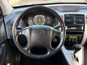 Grey Hyundai Tucson 2007 in Siauliai, with an engine capacity of 1.99 L and mileage of 170 thousand km for 2750 €, photo 42 on AUTOMOTO.COM.LV