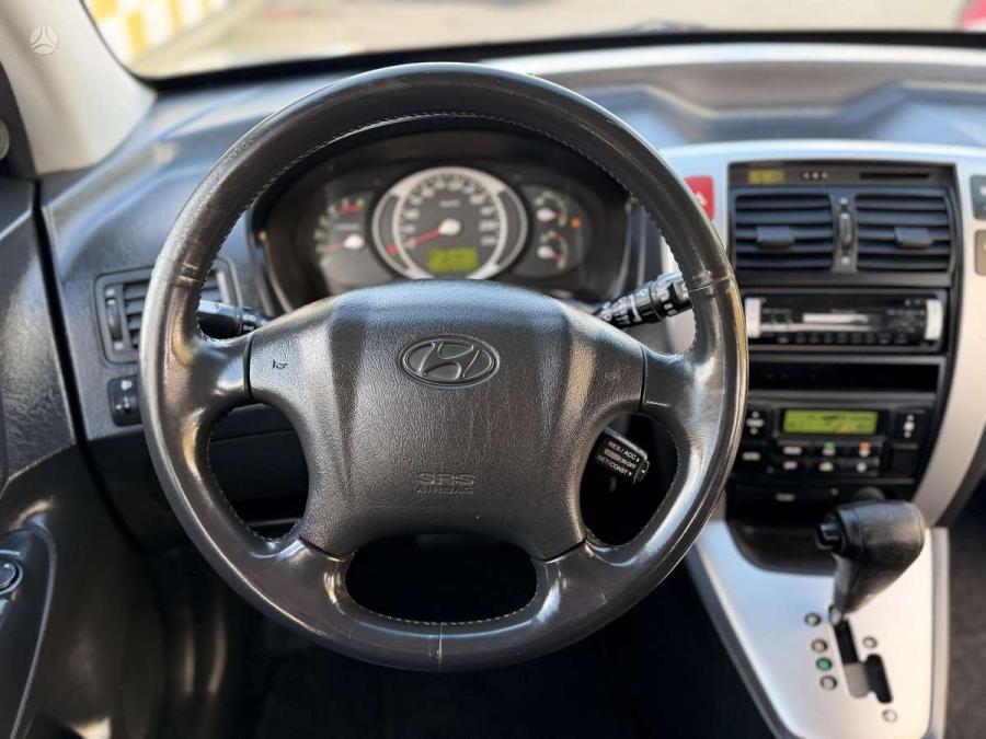 Grey Hyundai Tucson 2007 in Siauliai, with an engine capacity of 1.99 L and mileage of 170 thousand km for 2750 €, photo 42 on AUTOMOTO.COM.LV