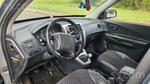 Pelēks Hyundai Tucson 2007 Daugavpils, ar dzinēja tilpumu 2.00 L un nobraukumu 336 tūkst. km par 1600 €, foto 8 vietnē AUTOMOTO.COM.LV