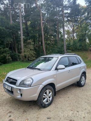 Pelēks Hyundai Tucson 2009 Rīga, ar dzinēja tilpumu 2.00 L un nobraukumu 230 tūkst. km par 4100 €, foto  vietnē AUTOMOTO.COM.LV