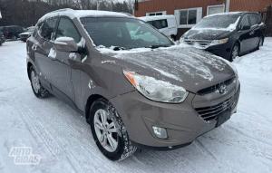 Grey Hyundai Tucson 2015 in Vilnius, with an engine capacity of 2.40 L and mileage of 198 thousand km for 12000 €, photo  on AUTOMOTO.COM.LV
