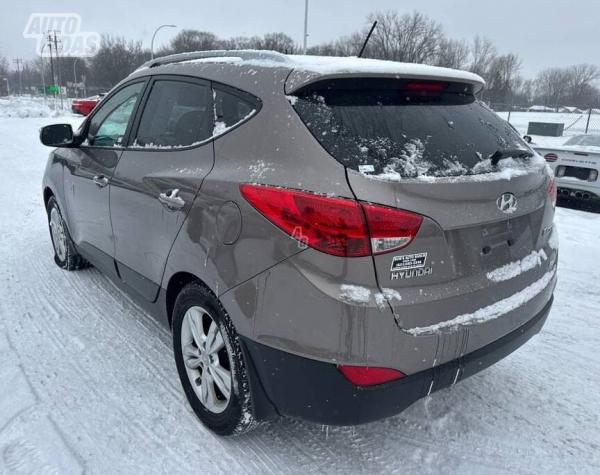 Grey Hyundai Tucson 2015 in Vilnius, with an engine capacity of 2.40 L and mileage of 198 thousand km for 12000 €, photo 5 on AUTOMOTO.COM.LV