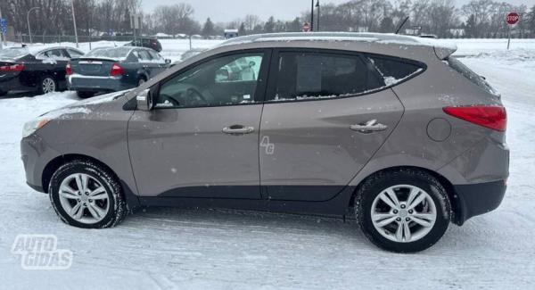 Grey Hyundai Tucson 2015 in Vilnius, with an engine capacity of 2.40 L and mileage of 198 thousand km for 12000 €, photo 6 on AUTOMOTO.COM.LV