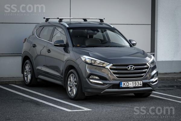 Grey Hyundai Tucson 2015 in Riga, with an engine capacity of 2.00 L and mileage of 259 thousand km for 9990 €, photo 4 on AUTOMOTO.COM.LV