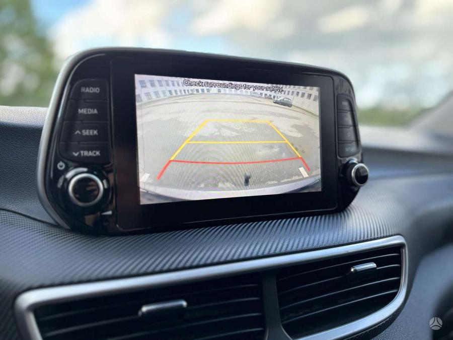 Grey Hyundai Tucson 2019 in Kaunas, with an engine capacity of 1.60 L and mileage of 296 thousand km for 11300 €, photo 28 on AUTOMOTO.COM.LV