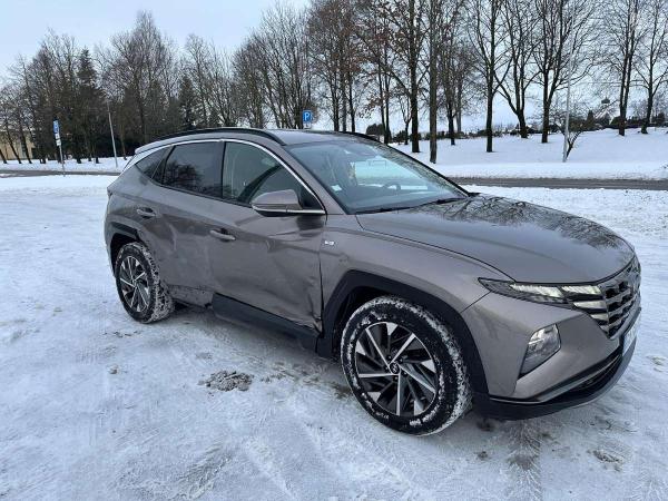 Grey Hyundai Tucson 2021 in Taurage, with an engine capacity of 1.60 L and mileage of 162 thousand km for 12999 €, photo 4 on AUTOMOTO.COM.LV