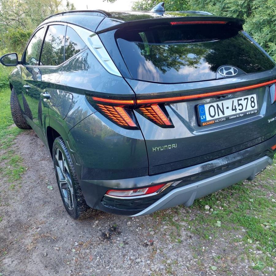 Grey Hyundai Tucson 2021 in Riga, with an engine capacity of 1.60 L and mileage of 54 thousand km for 21777 €, photo 4 on AUTOMOTO.COM.LV