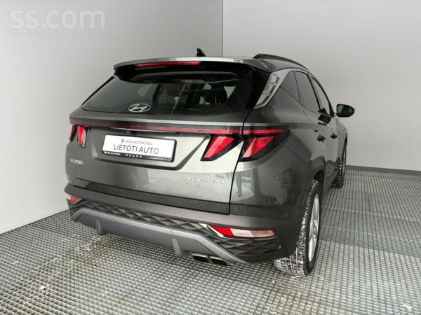 Grey Hyundai Tucson 2021 in Riga, with an engine capacity of 1.60 L and mileage of 107 thousand km for 18990 €, photo 3 on AUTOMOTO.COM.LV