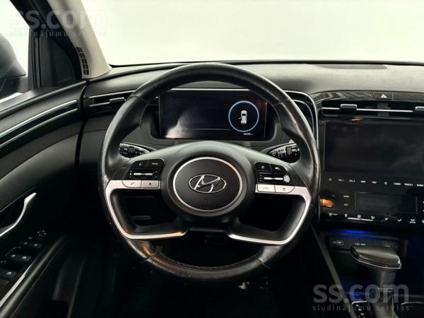 Grey Hyundai Tucson 2021 in Riga, with an engine capacity of 1.60 L and mileage of 107 thousand km for 18990 €, photo 9 on AUTOMOTO.COM.LV