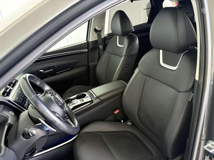 Grey Hyundai Tucson 2021 in Vilnius, with an engine capacity of 1.60 L and mileage of 126 thousand km for 23990 €, photo 23 on AUTOMOTO.COM.LV