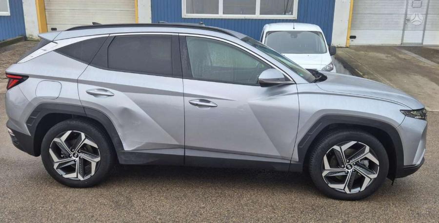 Grey Hyundai Tucson 2022 in Siauliai, with an engine capacity of 1.60 L and mileage of 57 thousand km for 21400 €, photo 2 on AUTOMOTO.COM.LV
