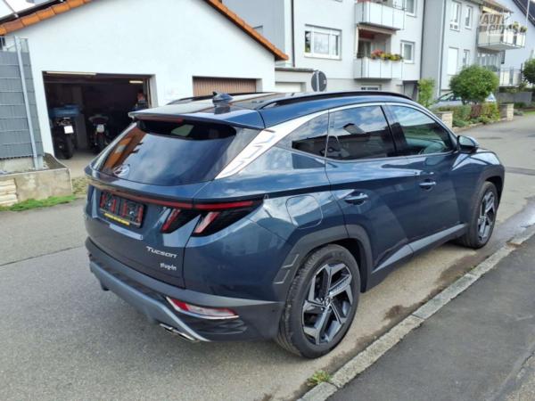 Grey Hyundai Tucson 2022 in Kaunas, with an engine capacity of 1.60 L and mileage of 38 thousand km for 33114 €, photo 3 on AUTOMOTO.COM.LV