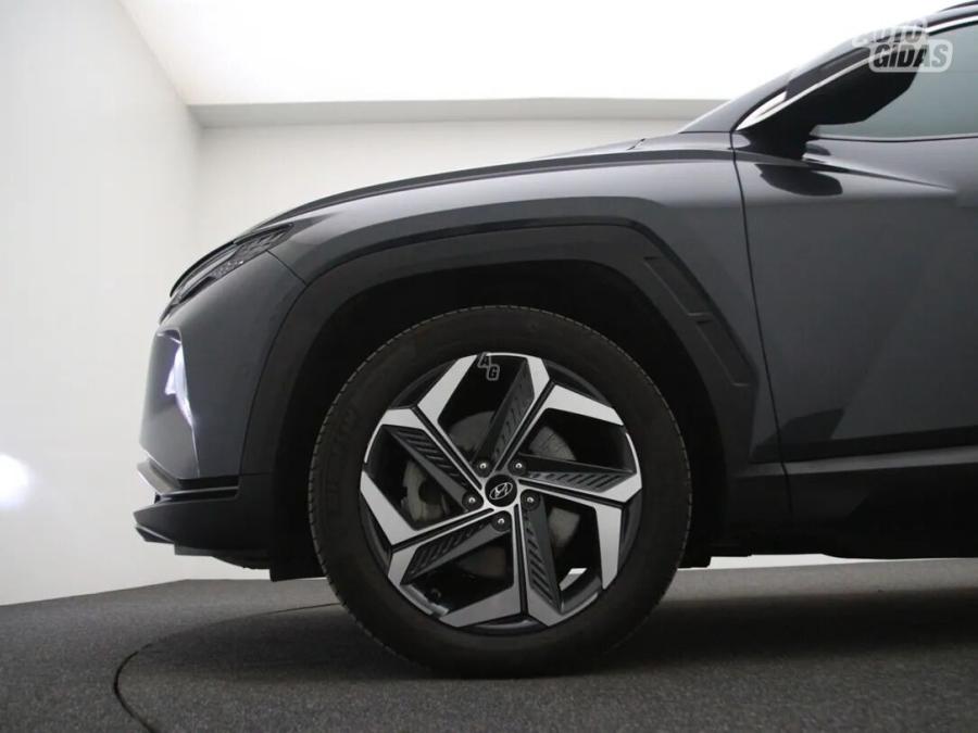 Grey Hyundai Tucson 2022 in Vilnius, with an engine capacity of 1.60 L and mileage of 116 thousand km for 24999 €, photo 29 on AUTOMOTO.COM.LV