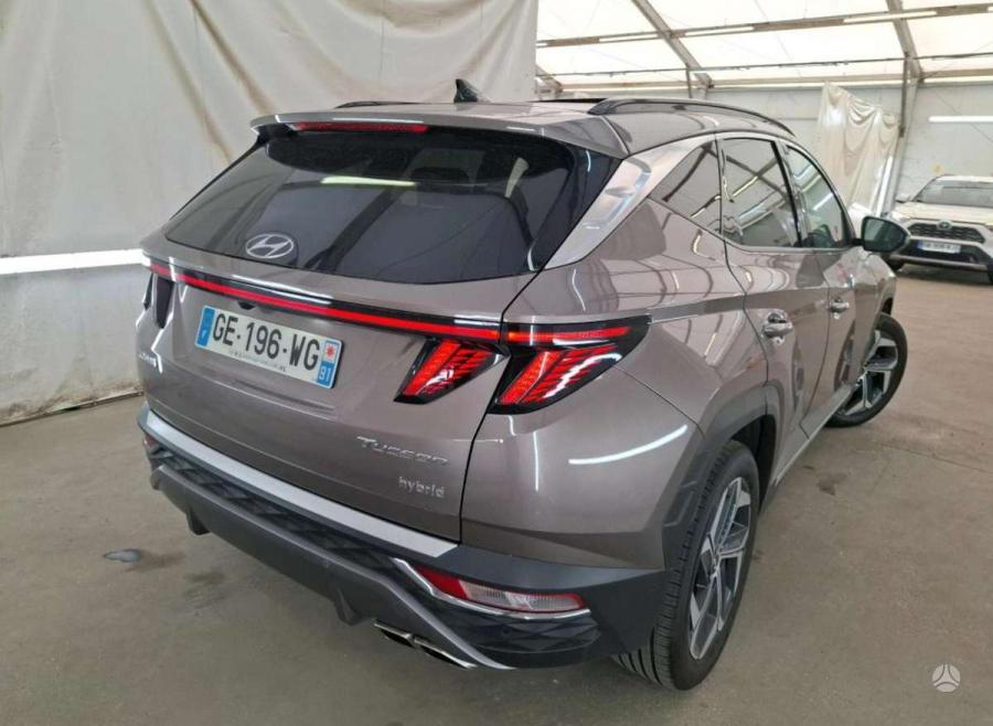 Grey Hyundai Tucson 2022 in Vilnius, with an engine capacity of 1.60 L and mileage of 109 thousand km for 23990 €, photo 4 on AUTOMOTO.COM.LV