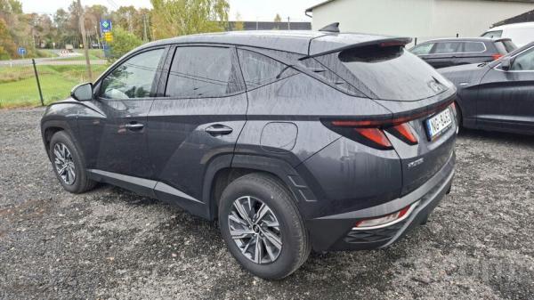 Grey Hyundai Tucson 2022 in Riga, with an engine capacity of 1.60 L and mileage of 163 thousand km for 18500 €, photo 5 on AUTOMOTO.COM.LV