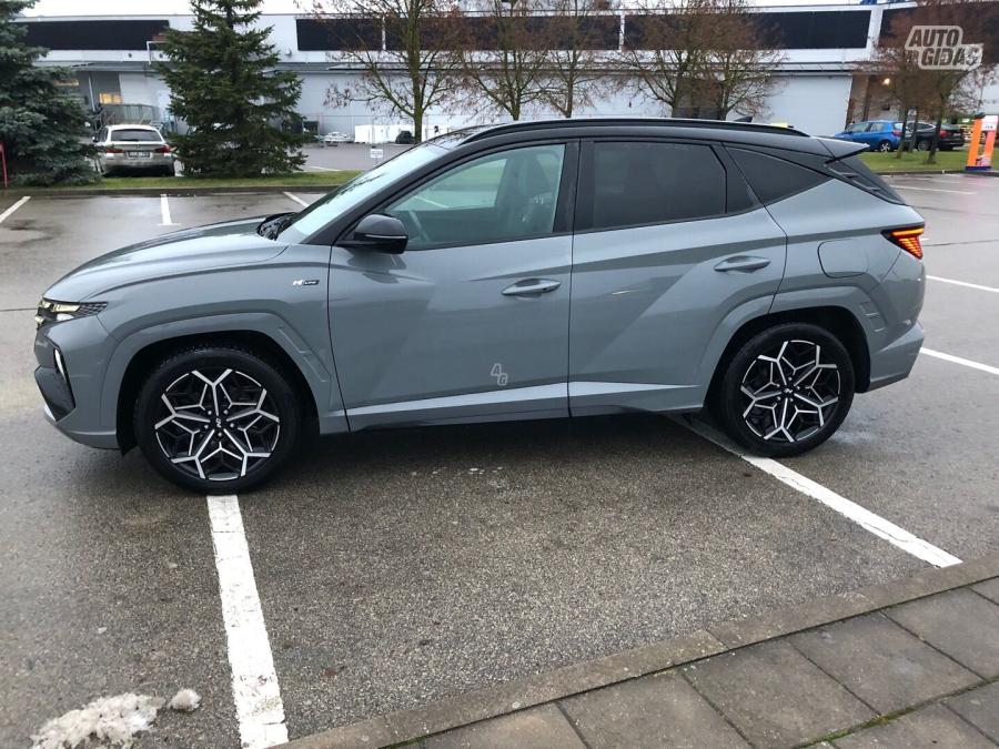 Grey Hyundai Tucson 2023 in Panevezys, with an engine capacity of 1.60 L and mileage of 57 thousand km for 28000 €, photo 3 on AUTOMOTO.COM.LV