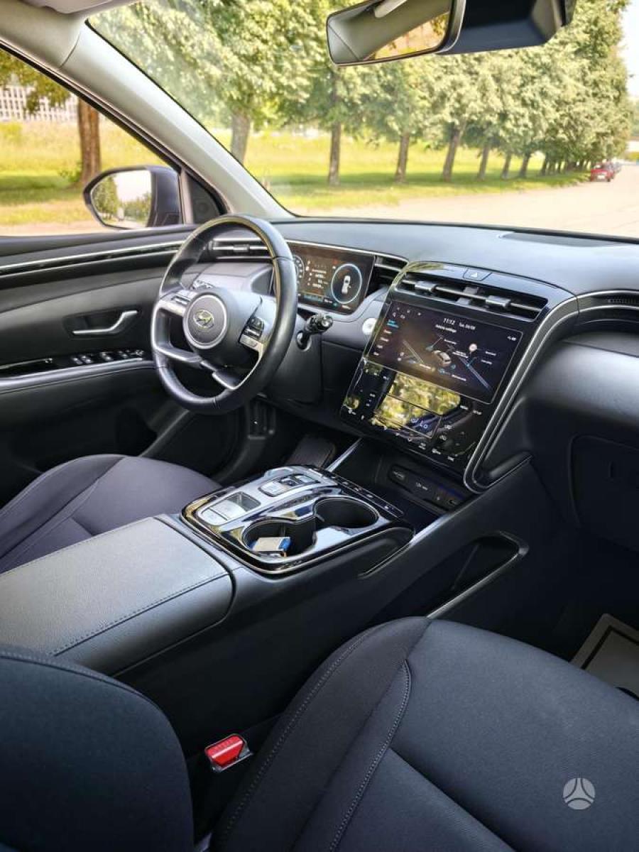 Grey Hyundai Tucson 2023 in Vilnius, with an engine capacity of 1.60 L and mileage of 74 thousand km for 25000 €, photo 13 on AUTOMOTO.COM.LV