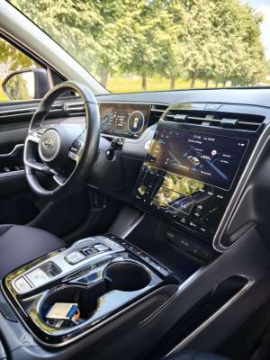 Grey Hyundai Tucson 2023 in Vilnius, with an engine capacity of 1.60 L and mileage of 74 thousand km for 25000 €, photo 14 on AUTOMOTO.COM.LV