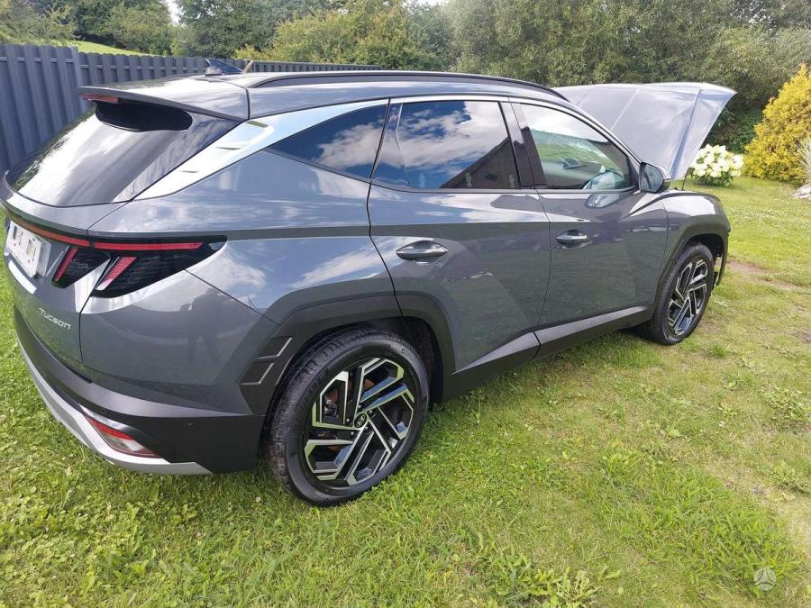 Grey Hyundai Tucson 2024 in Kedainiai, with an engine capacity of 1.60 L and mileage of 21 thousand km for 12950 €, photo 7 on AUTOMOTO.COM.LV