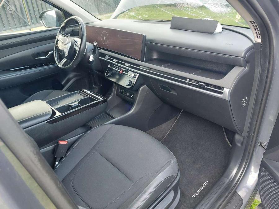 Grey Hyundai Tucson 2024 in Kedainiai, with an engine capacity of 1.60 L and mileage of 21 thousand km for 12950 €, photo 23 on AUTOMOTO.COM.LV