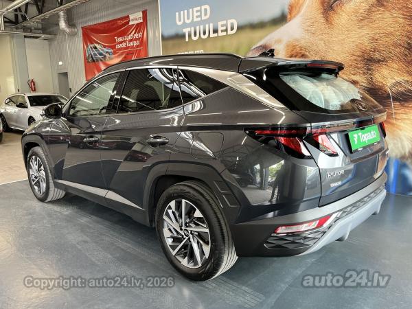 Grey Hyundai Tucson 2021 in Tallinn, with an engine capacity of 1.60 L and mileage of 57 thousand km for 22900 €, photo 3 on AUTOMOTO.COM.LV