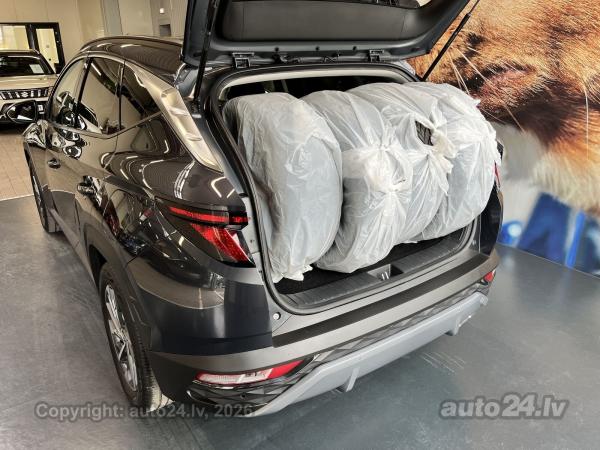 Grey Hyundai Tucson 2021 in Tallinn, with an engine capacity of 1.60 L and mileage of 57 thousand km for 22900 €, photo 4 on AUTOMOTO.COM.LV