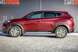 Red Hyundai Tucson 2015 in Riga, with an engine capacity of 2.00 L and mileage of 227 thousand km for 12990 €, photo 5 on AUTOMOTO.COM.LV