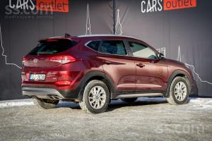 Red Hyundai Tucson 2015 in Riga, with an engine capacity of 2.00 L and mileage of 227 thousand km for 12990 €, photo 6 on AUTOMOTO.COM.LV