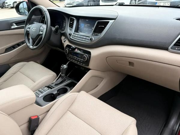 Hyundai Tucson 2016 RÄ«ga vietnÄ Sarkans Hyundai Tucson 2016 RÄ«ga, ar dzinÄja tilpumu 1.60 L un nobraukumu 184 tÅ«kst. km par 11990 ā¬, foto 7 vietnÄ AUTOMOTO.COM.LV