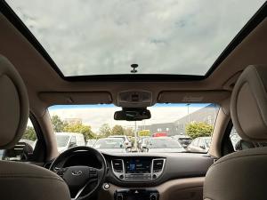 Red Hyundai Tucson 2016 in Riga, with an engine capacity of 1.60 L and mileage of 184 thousand km for 11990 €, photo 11 on AUTOMOTO.COM.LV