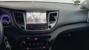 Red Hyundai Tucson 2017 in Taurage, with an engine capacity of 1.59 L and mileage of 128 thousand km for 9800 €, photo 11 on AUTOMOTO.COM.LV