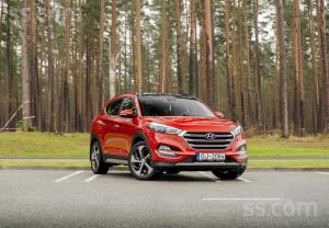Red Hyundai Tucson 2018 in Riga, with an engine capacity of 1.70 L and mileage of 242 thousand km for 12190 €, photo 2 on AUTOMOTO.COM.LV