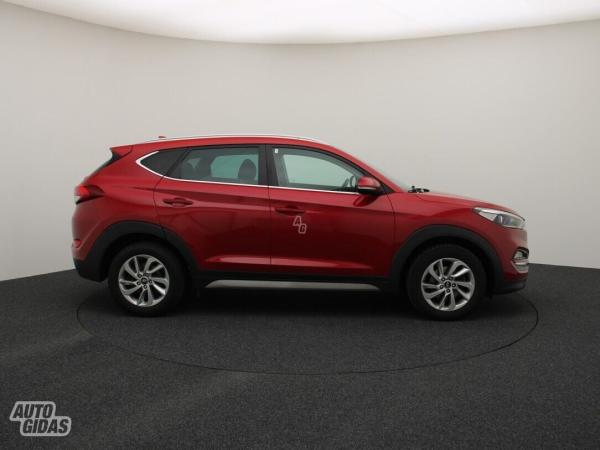 Red Hyundai Tucson 2018 in Vilnius, with an engine capacity of 1.70 L and mileage of 226 thousand km for 12399 €, photo 9 on AUTOMOTO.COM.LV