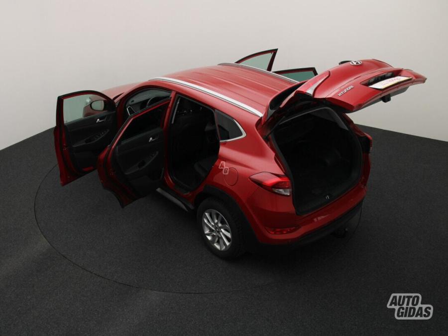 Red Hyundai Tucson 2018 in Vilnius, with an engine capacity of 1.70 L and mileage of 226 thousand km for 12399 €, photo 13 on AUTOMOTO.COM.LV