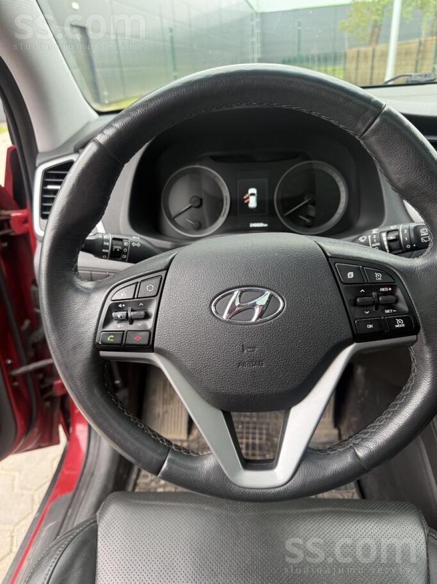Red Hyundai Tucson 2018 in Riga, with an engine capacity of 1.70 L and mileage of 253 thousand km for 13000 €, photo 12 on AUTOMOTO.COM.LV