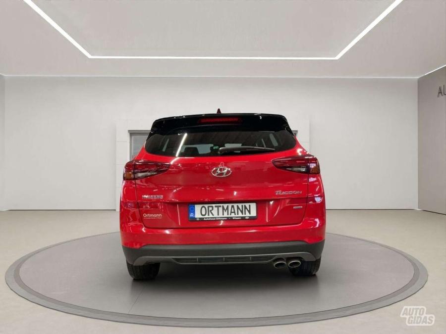 Red Hyundai Tucson 2019 in Kaunas, with an engine capacity of 1.60 L and mileage of 60 thousand km for 24347 €, photo 6 on AUTOMOTO.COM.LV
