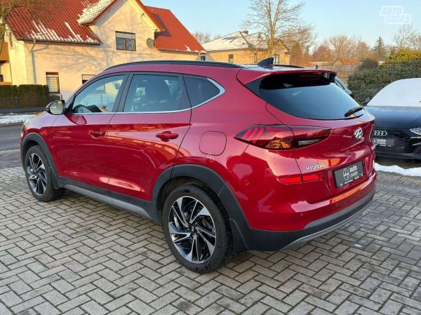 Red Hyundai Tucson 2019 in Kaunas, with an engine capacity of 1.60 L and mileage of 57 thousand km for 22286 €, photo 3 on AUTOMOTO.COM.LV