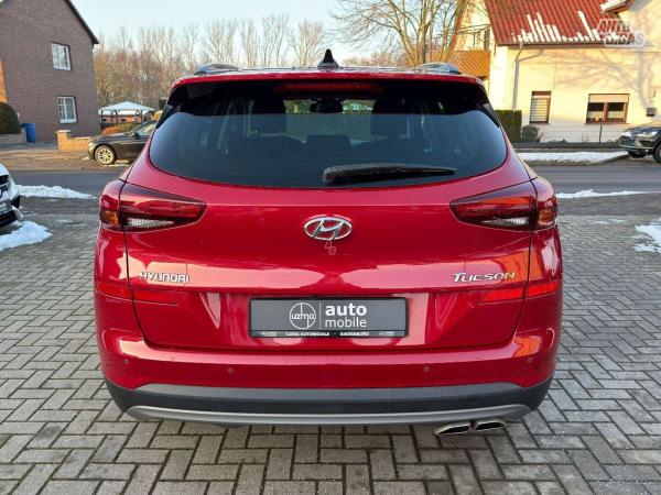 Red Hyundai Tucson 2019 in Kaunas, with an engine capacity of 1.60 L and mileage of 57 thousand km for 22286 €, photo 4 on AUTOMOTO.COM.LV
