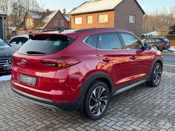 Red Hyundai Tucson 2019 in Kaunas, with an engine capacity of 1.60 L and mileage of 57 thousand km for 22286 €, photo 5 on AUTOMOTO.COM.LV
